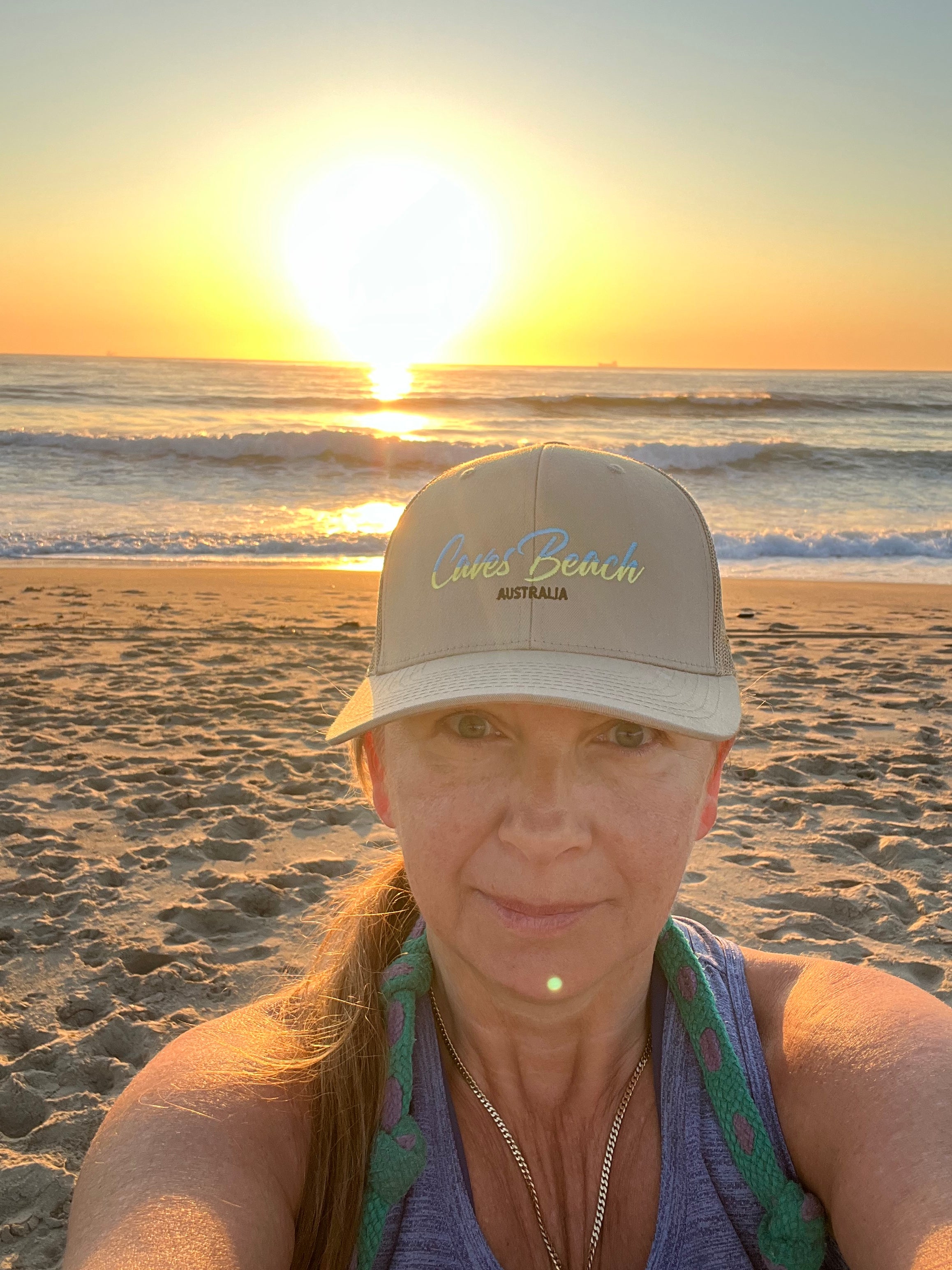 Caves beach caps – Cave Woman Australia